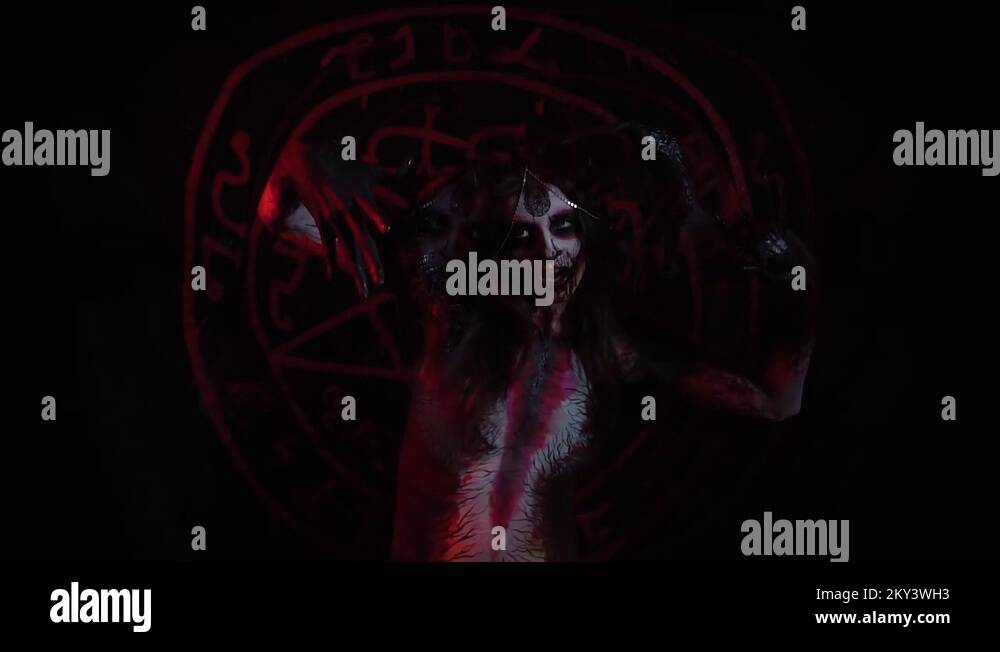Performing a ritual demon dances on the pentagram, montage Stock Video ...