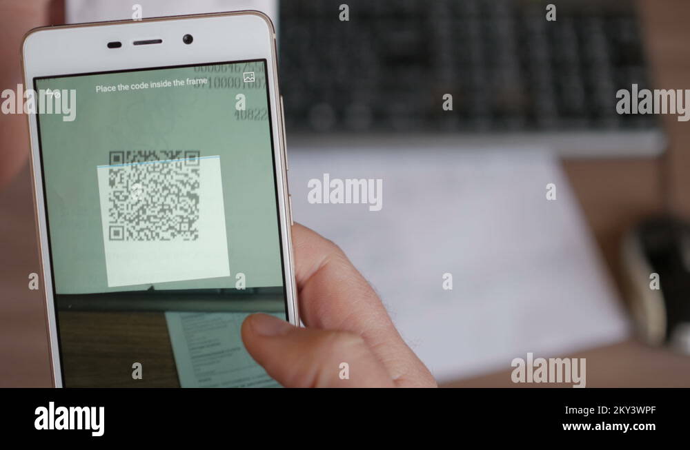 A man scans the QR code on a check from a supermarket Stock Video ...