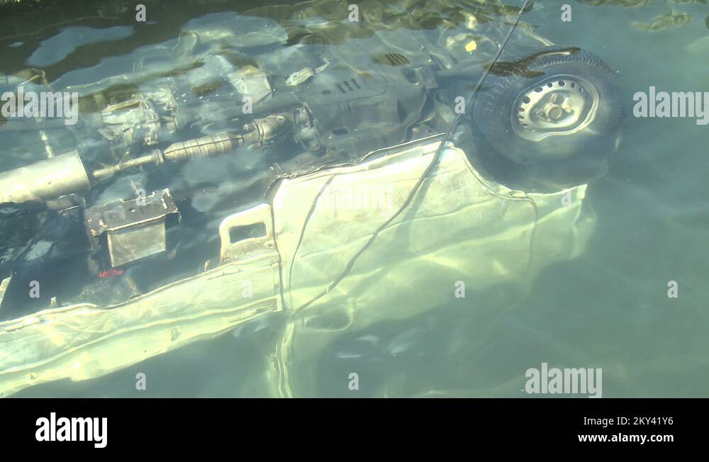 Japan Tsunami Aftermath - Van Lies Submerged In Sea In Kesennuma City ...