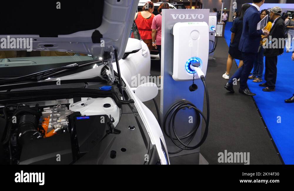 Volvo Car Charging At Exhibition Of Automobile Industry. Electric ...