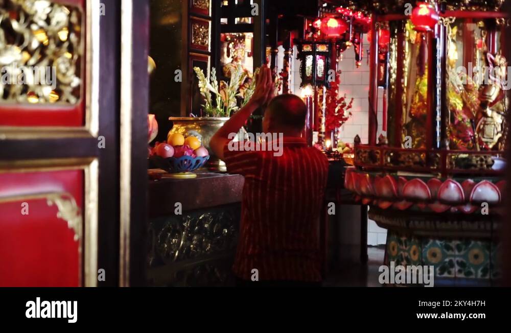 Chinese man praying Stock Videos & Footage - HD and 4K Video Clips - Alamy