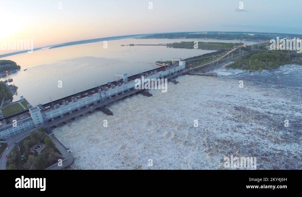 Hydroelectric power station by top view of ridge's dam. Clip. Top view ...