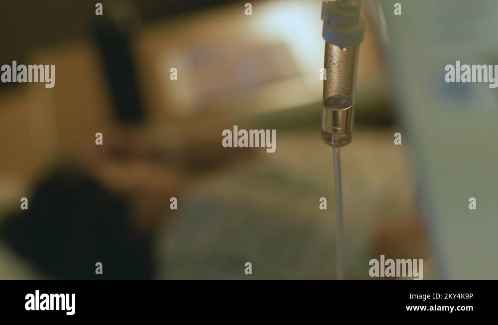Hospital Bed Female Patient IV Drip Scene Out of Focus Woman Giving ...