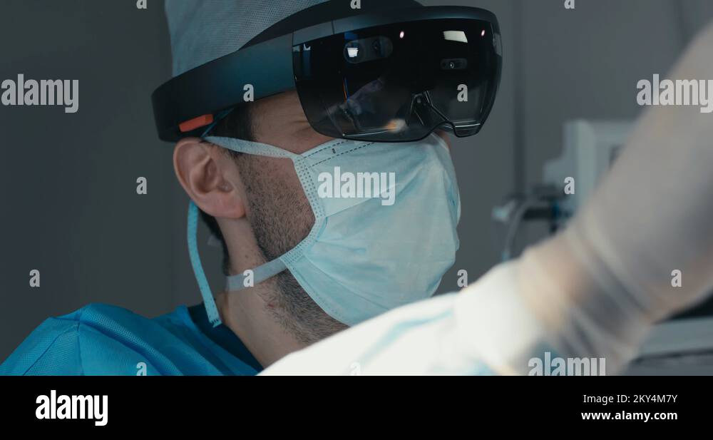 Portrait of surgeon using augmented reality hololens headset during ...
