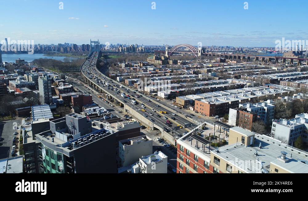 Far Away View of RFK and Hell Gate Bridge - Reverse Pull Away Shot ...