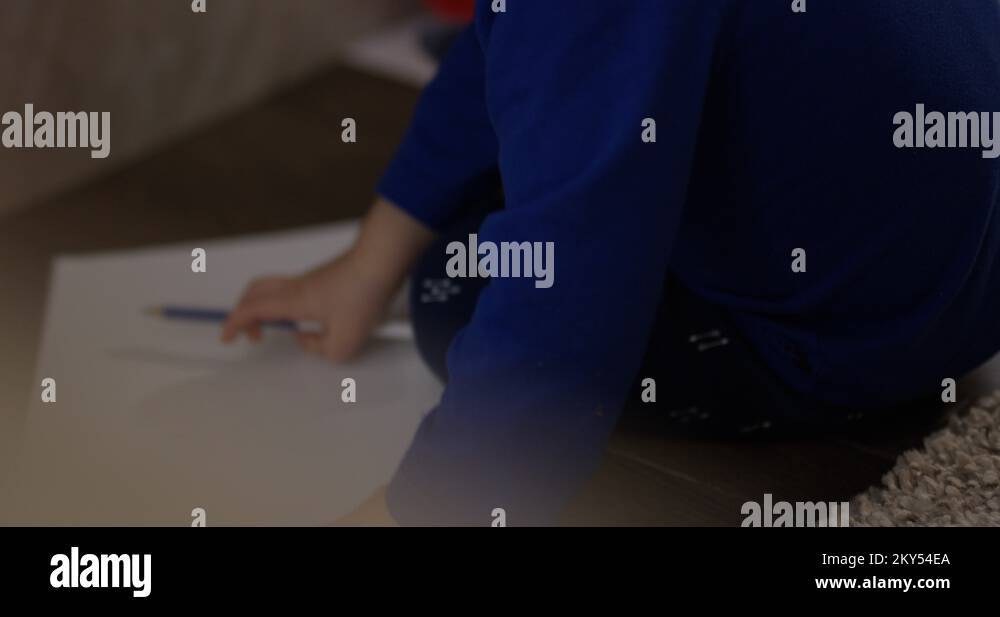 Toddler picking up stack of paper from floor - close up Stock Video ...