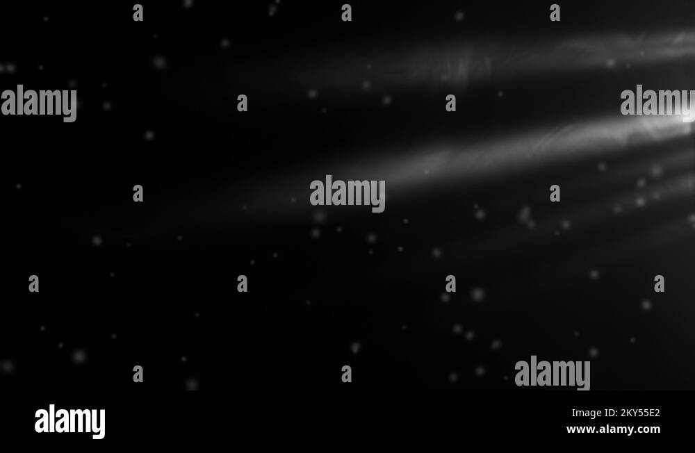 Floating Dust Particles in a Beam of Light Stock Video Footage - Alamy