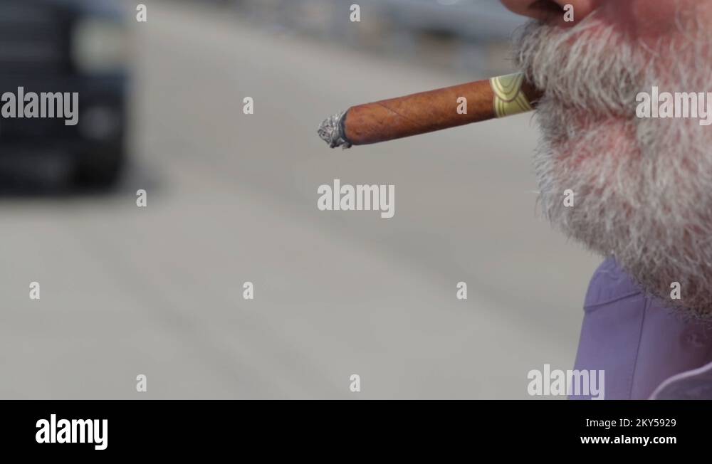 Smoking and talking outside. Old man with white beard smoking a ...