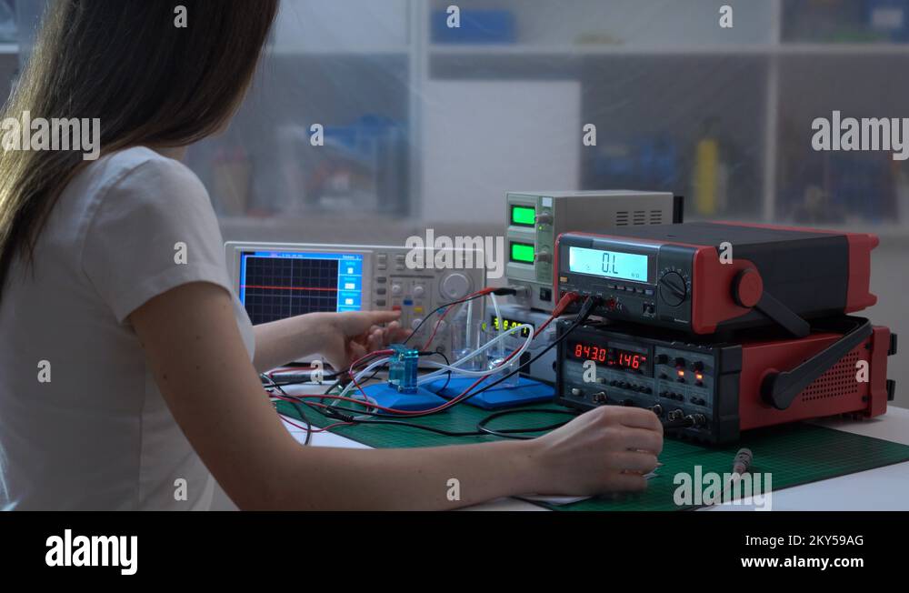 Young girl student in physical lab with hydrogen power cell Stock Video ...