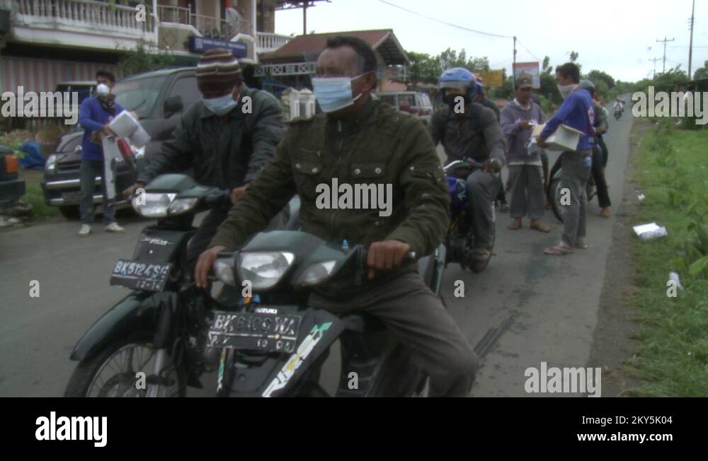 Local People Wear Face Masks During Volcanic Eruption Crisis In ...