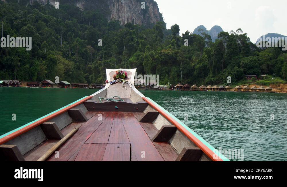 Wooden Longtail Nose Heading Towards Bamboo Raft Houses at Cheow Lan ...