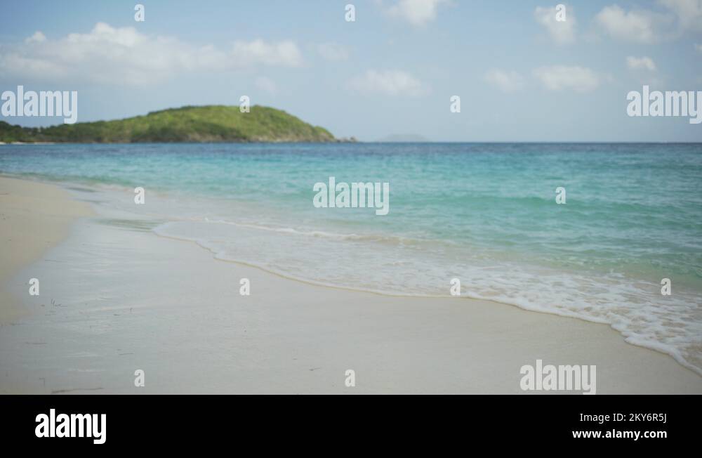 Background Plate of The blue tide coming in on the shore for green ...
