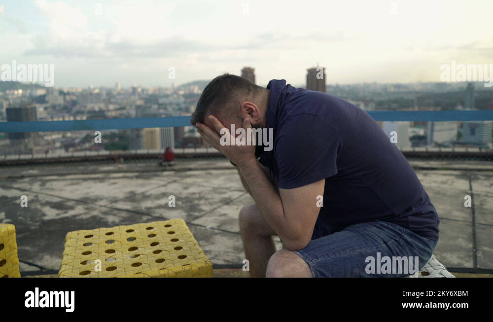 Man sitting rooftop terrace Stock Videos & Footage - HD and 4K Video ...