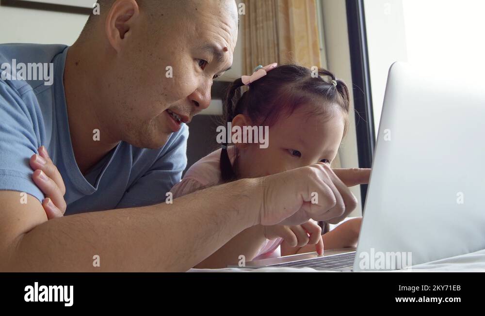 Daughter father computer Stock Videos & Footage - HD and 4K Video Clips ...