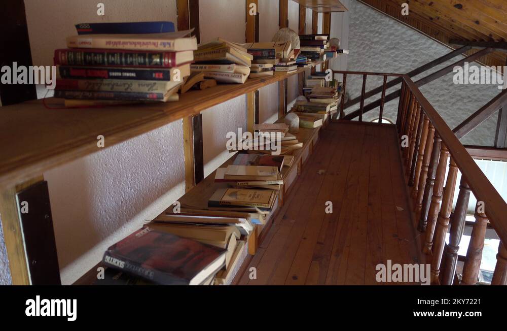 Littered books on the shelves at the upper storey Stock Video Footage ...