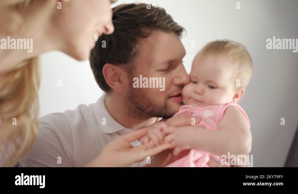 Father kissing baby girl Stock Videos & Footage - HD and 4K Video Clips - Alamy