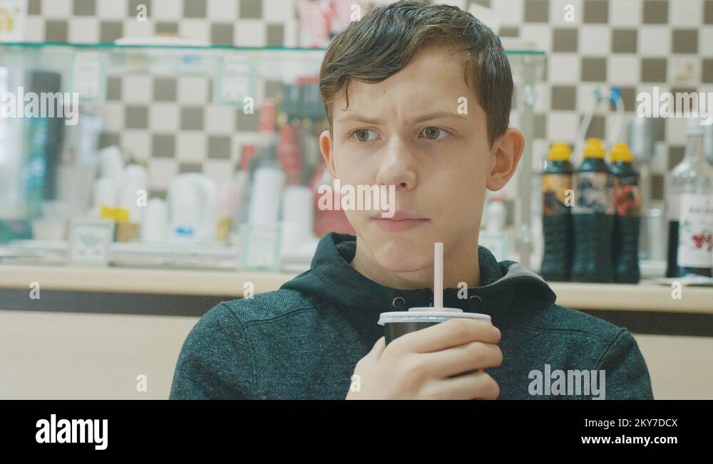 Obese fat boy drinking cola isolated on white background, junk food ...