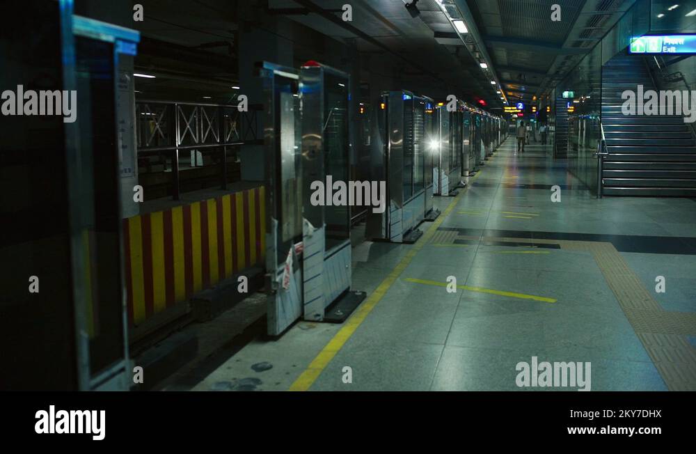 Modern metro train is arriving to the station of underground. INDIA ...