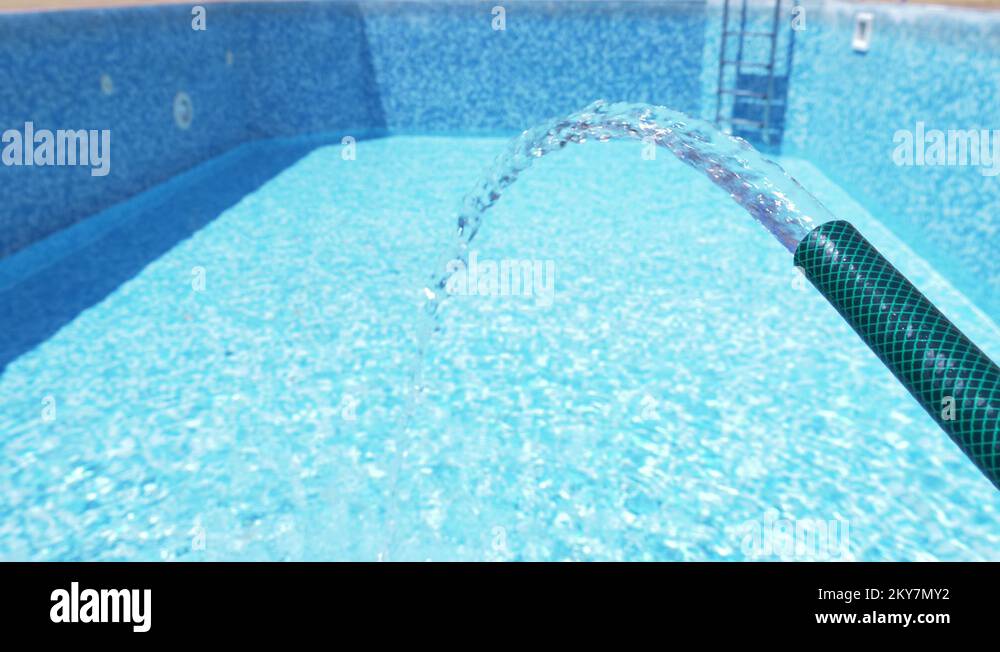 Pool Water Background Loop. water flows into the pool from the hose ...