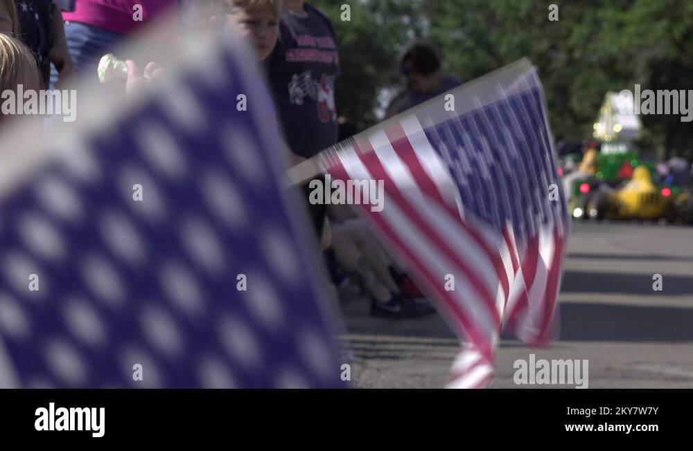 Waving American Flags along 4th of July parade route 4k Stock Video ...