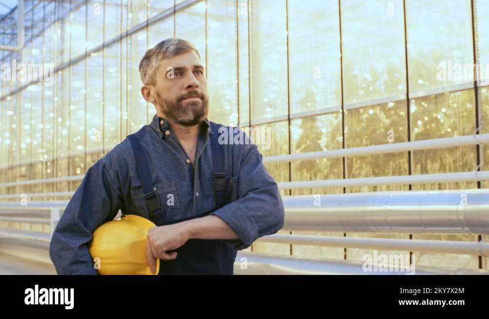 Man work hard hat Stock Videos & Footage - HD and 4K Video Clips - Alamy