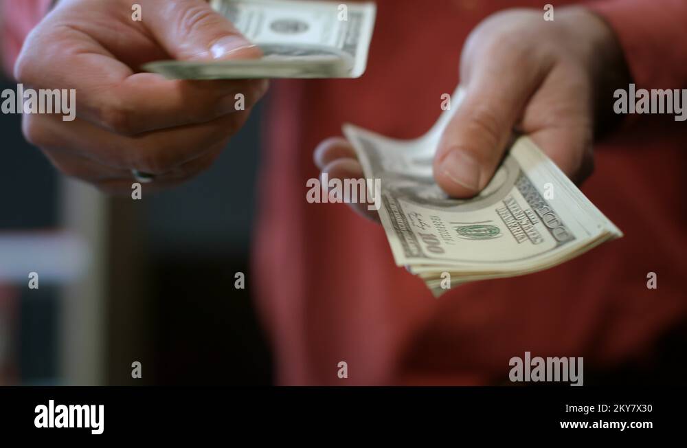 Man counting dollar bills. Close up of male hands count money cash Stock Video Footage - Alamy