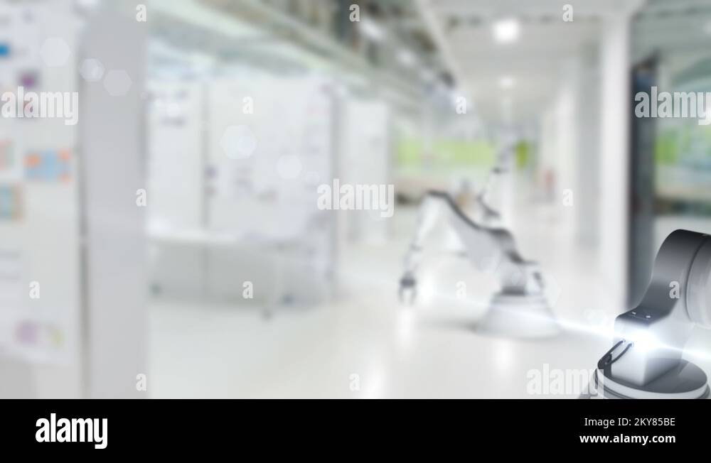 Digitally generated video of robotic arm holding card with diagram of ...