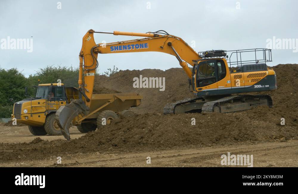 Clearing a construction site using earth moving plant Stock Video ...