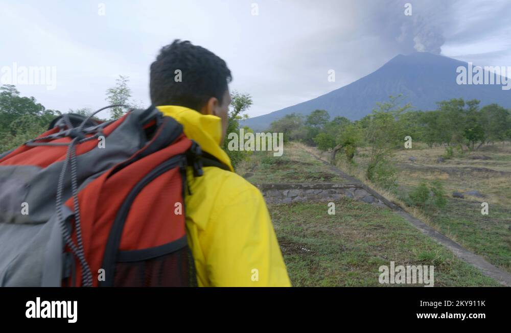 Hiker Watching Volcano Eruption Stock Video Footage - Alamy