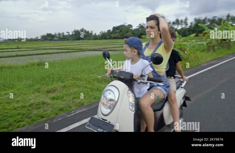 Woman riding small motorcycle Stock Videos & Footage - HD and 4K Video ...