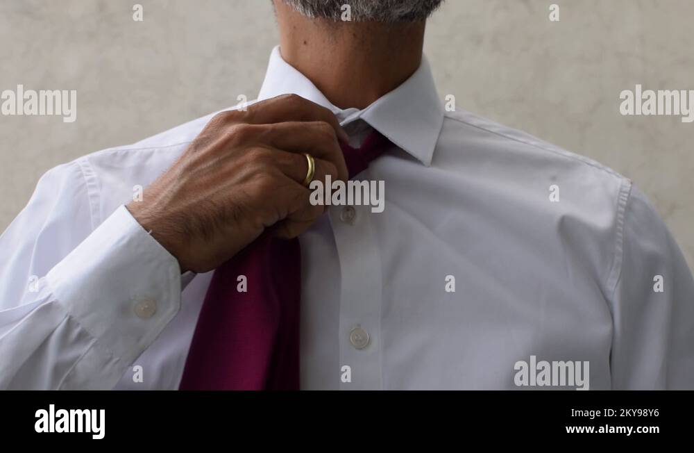 Man taking off tie Stock Videos & Footage - HD and 4K Video Clips - Alamy