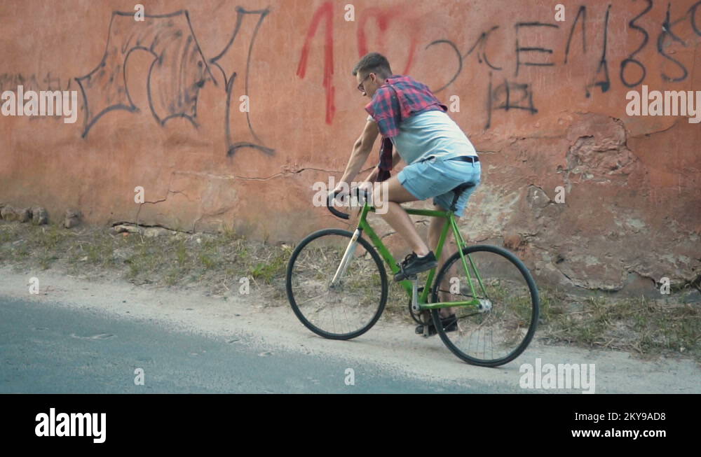 Man looking back cycling Stock Videos & Footage - HD and 4K Video Clips ...