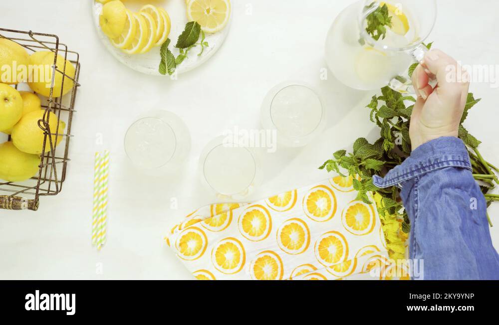 Step by step. Pouring traditional fresh lemonade in glasses Stock Video ...