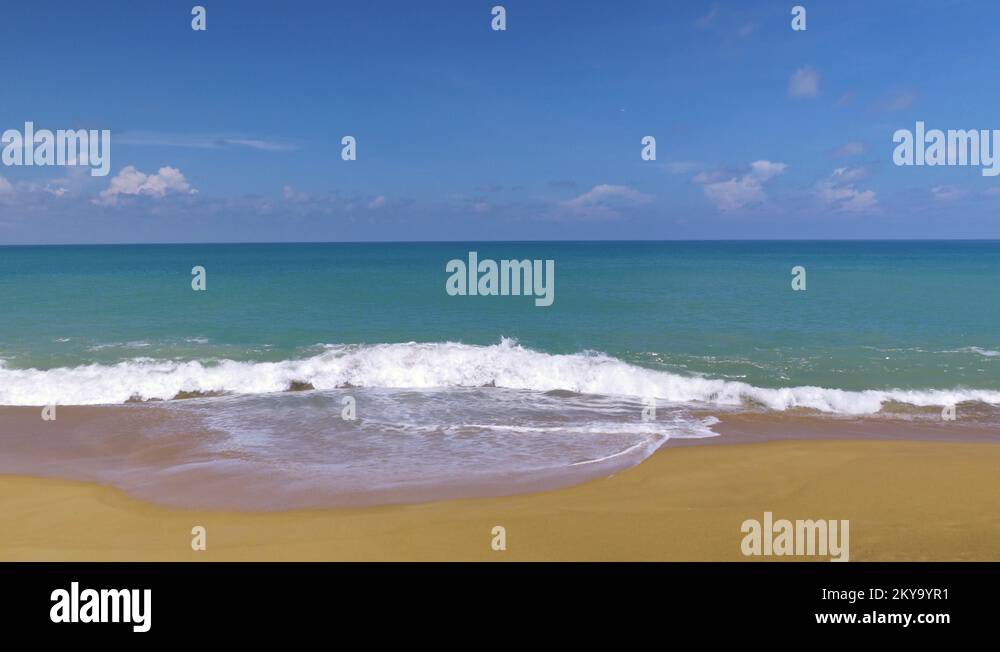 Beautiful blue ocean on sandy beach background with motion scene Stock ...