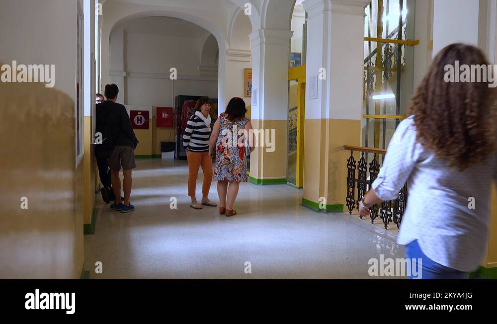 Teachers and students walk in high school hallways Stock Video Footage ...