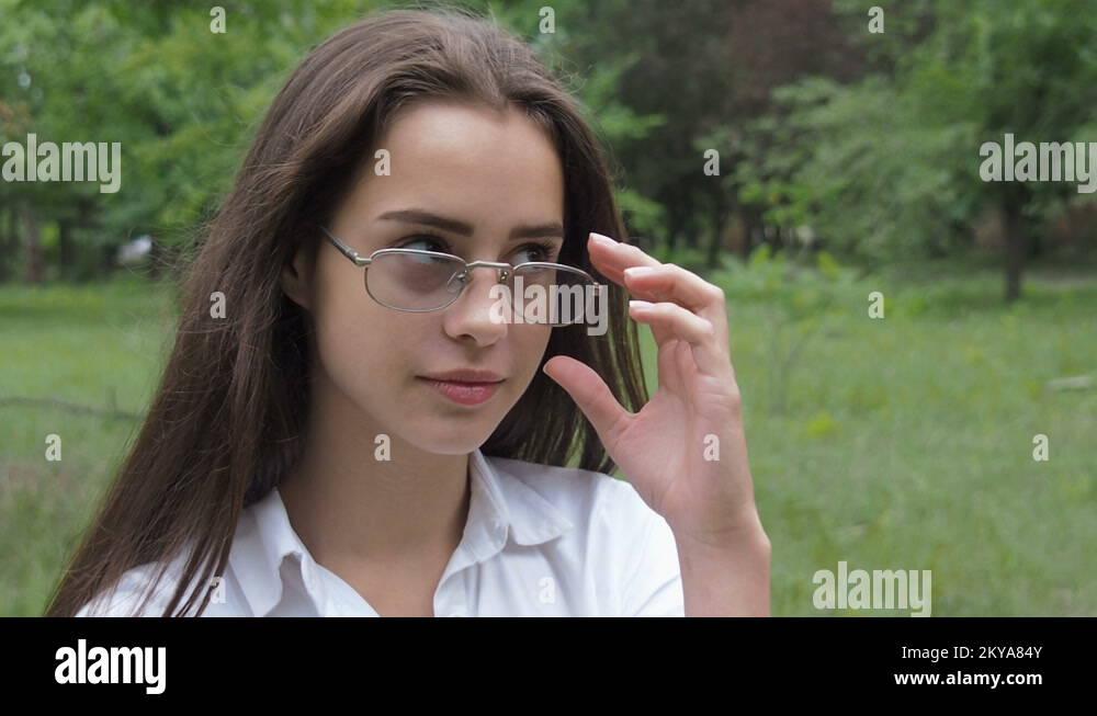 Pretty girl glasses Stock Videos & Footage - HD and 4K Video Clips - Alamy