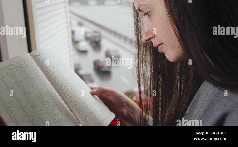 Girl with dictionary Stock Videos & Footage - HD and 4K Video Clips - Alamy