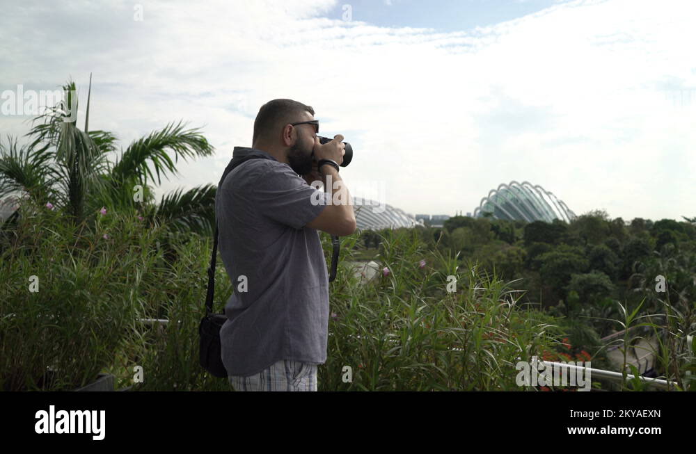 Singapore man camera Stock Videos & Footage - HD and 4K Video Clips - Alamy