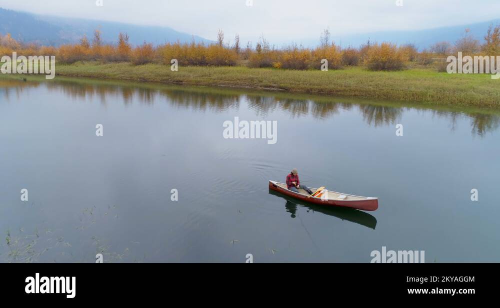 Man rowing a boat on a lake 4k Stock Video Footage - Alamy
