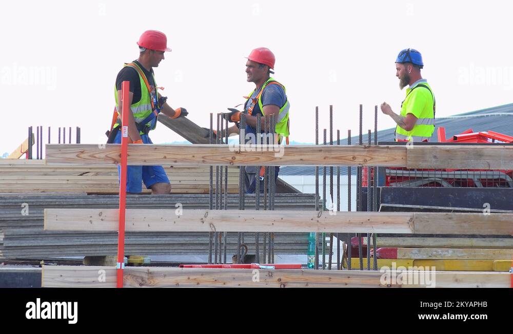 Workmen high on a building Stock Videos & Footage - HD and 4K Video ...