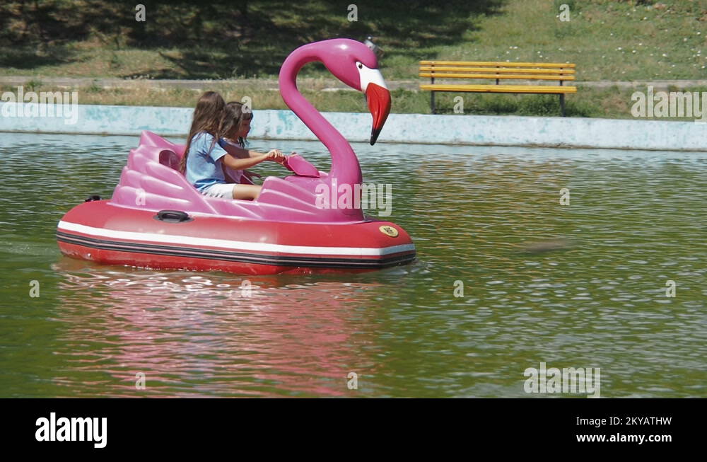 Children ride on a water attraction Stock Video Footage - Alamy
