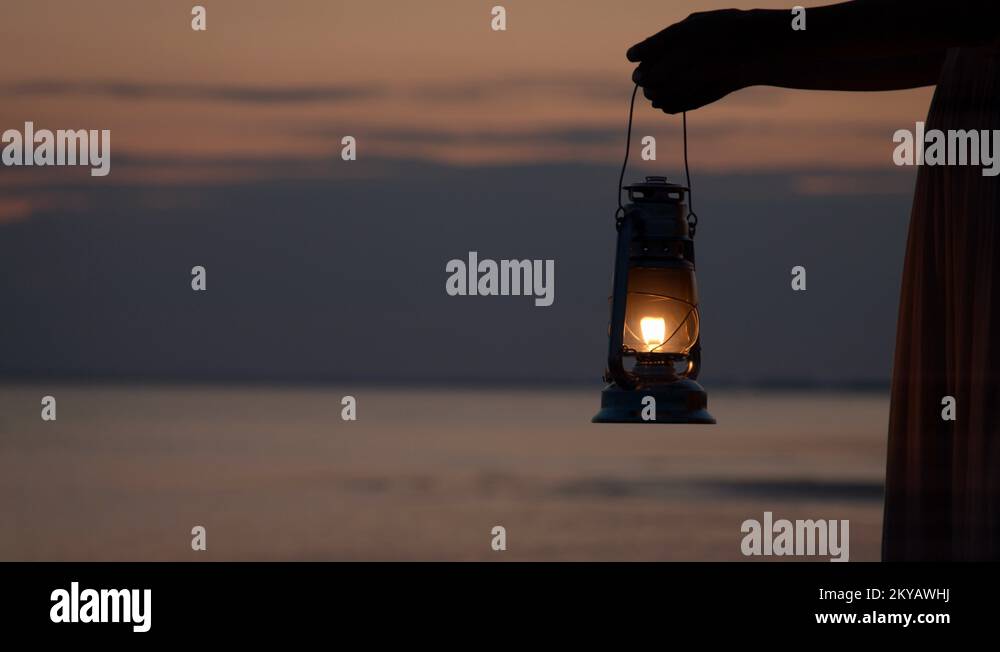 Hand holding lantern Stock Videos & Footage - HD and 4K Video Clips - Alamy