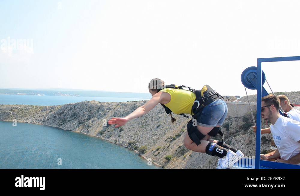 Bungee jump Maslenica bridge. Jump off a bridge with a rope Stock Video ...