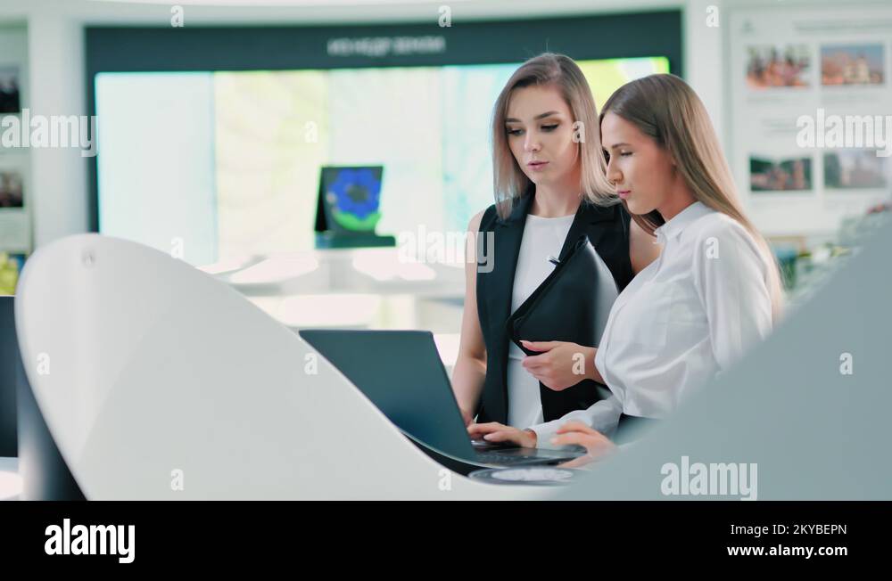 Research staff in modern futuristic laboratory discussing development of digital Stock Video ...