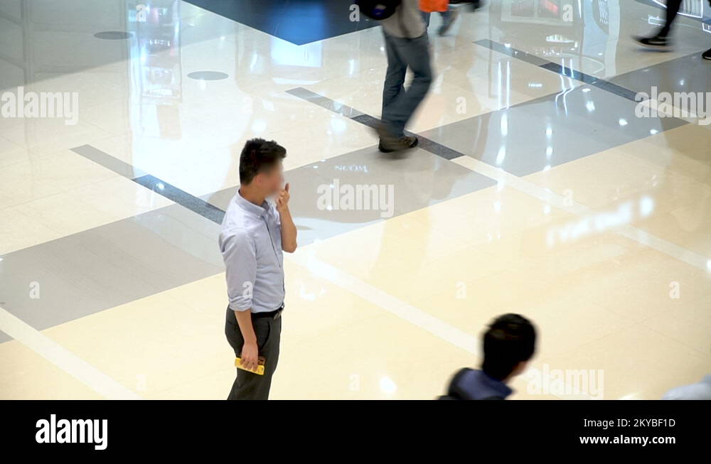 Crowd of anonymous unrecognizable people walking in a shopping mall in ...