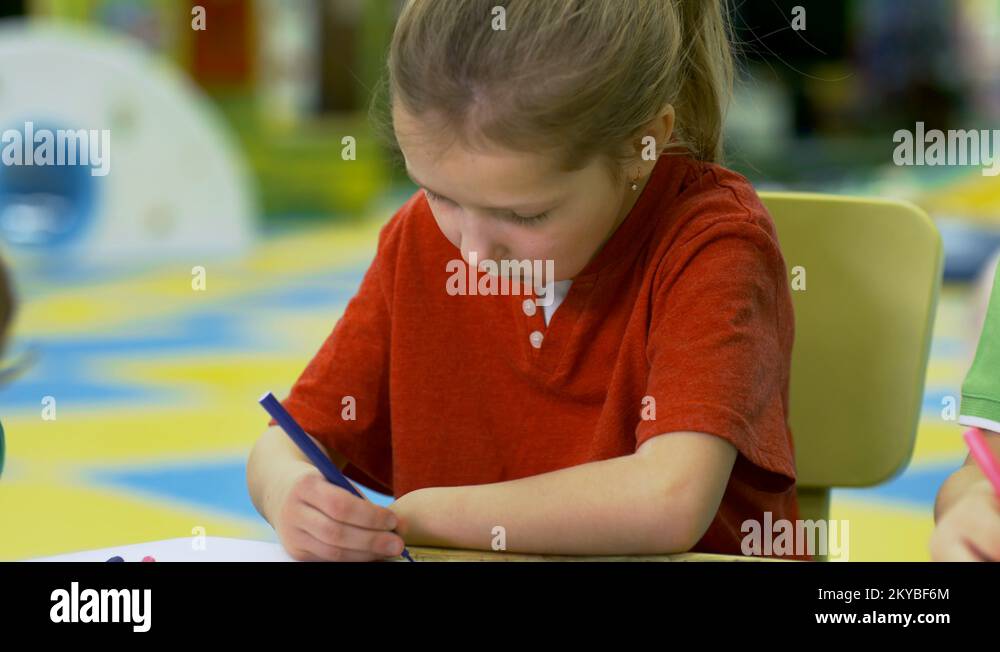 Concentrated Little Girl Drawing Picture Stock Video Footage - Alamy