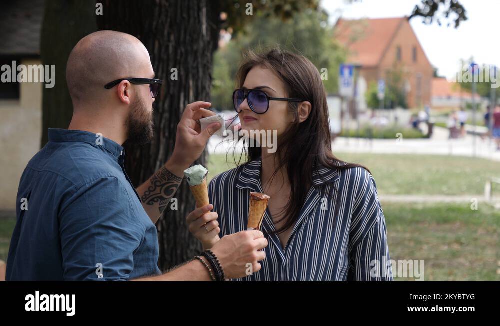 Clean smudged face after eating ice cream cones young people take care ...