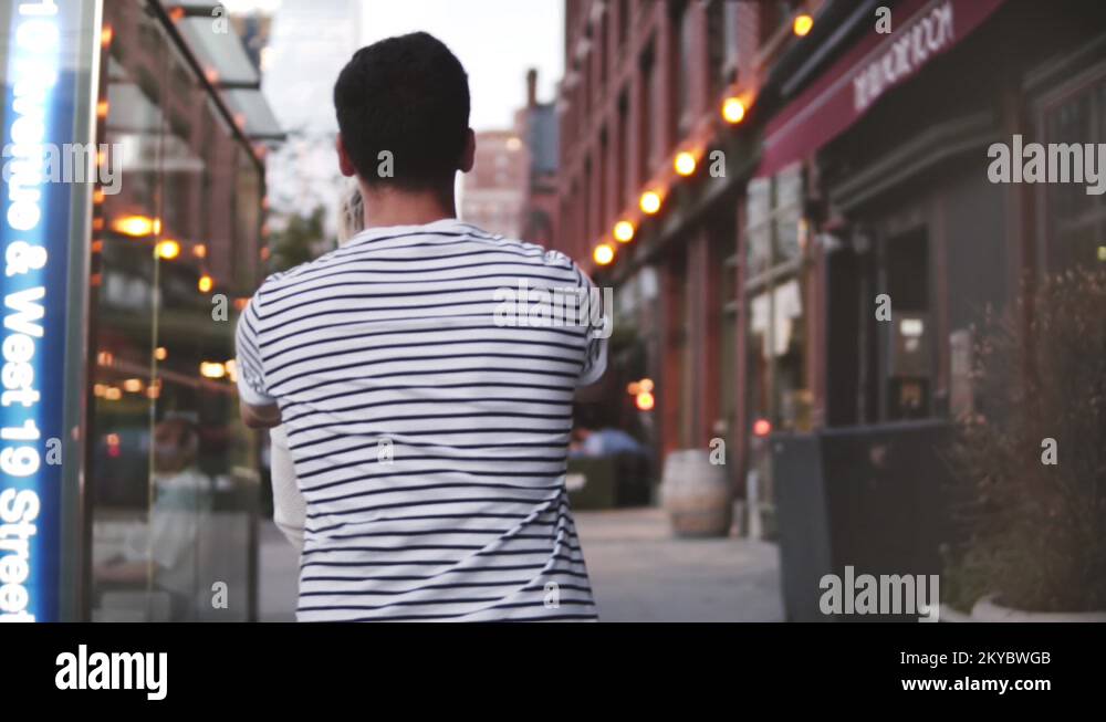 Slow motion happy romantic couple having fun bonding time together ...