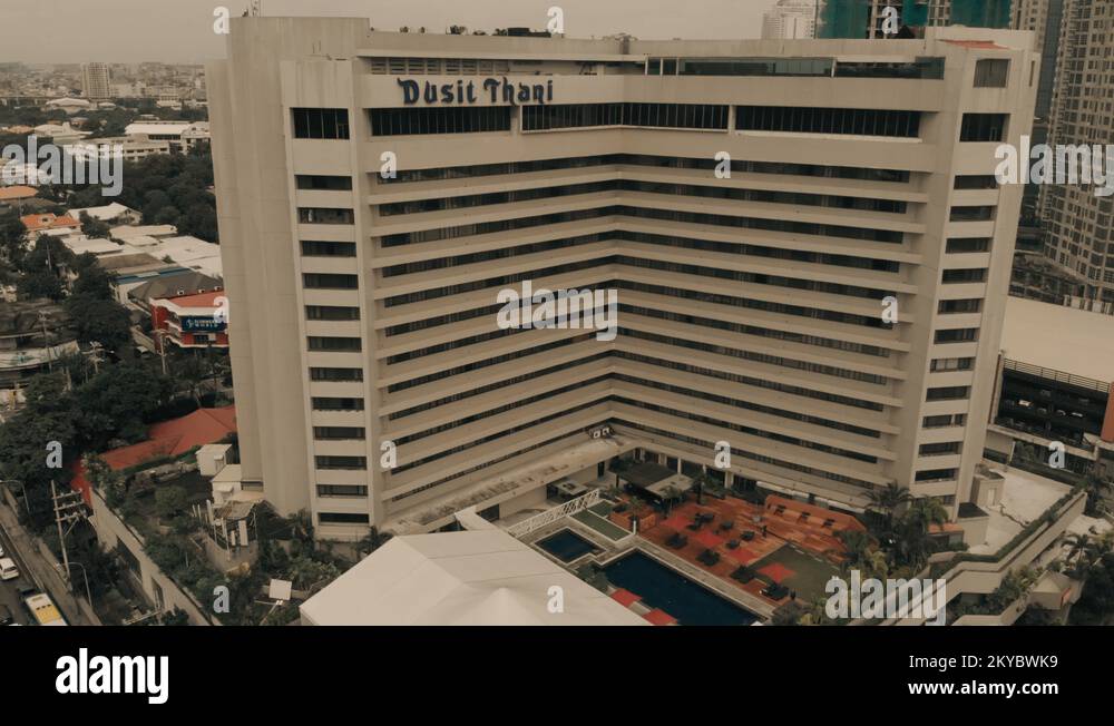 Drone Aerial: Dusit Thani Hotel Manila Establishing Shot Pull out Stock ...