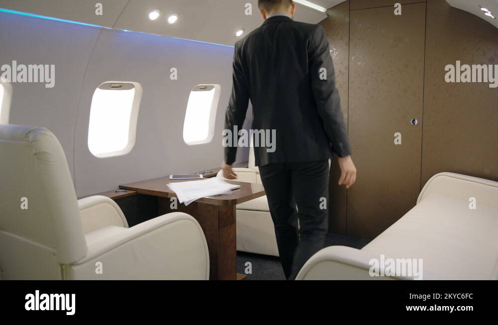 Man in plane seat Stock Videos & Footage - HD and 4K Video Clips - Alamy